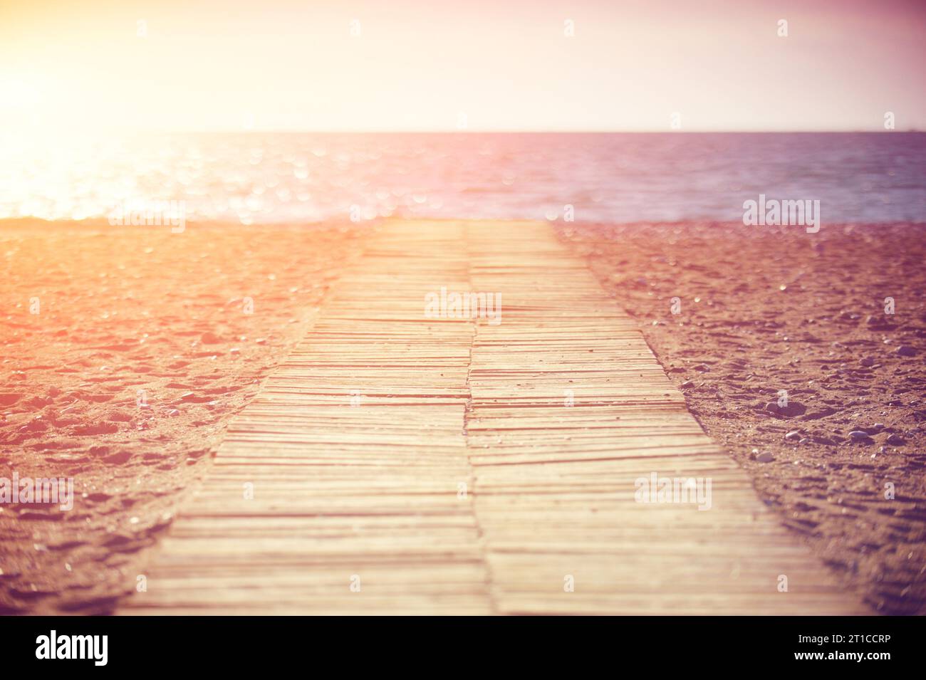 wooden path on the beach to the sea Stock Photo - Alamy