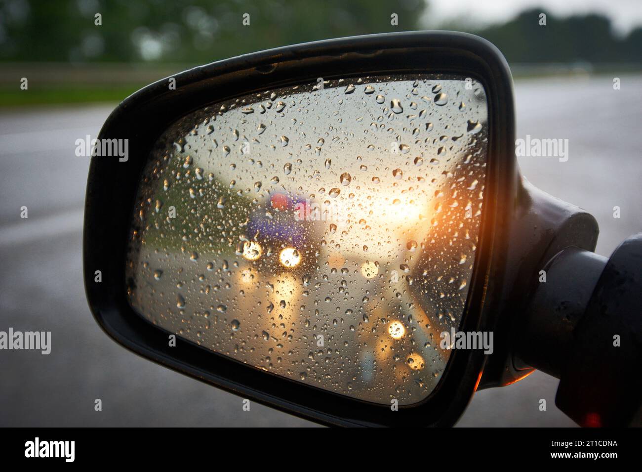 Car mirror behind wet hi-res stock photography and images - Alamy