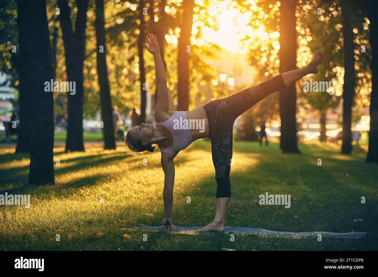 Beautiful sporty fit yogini woman practices yoga asana Ardha ...