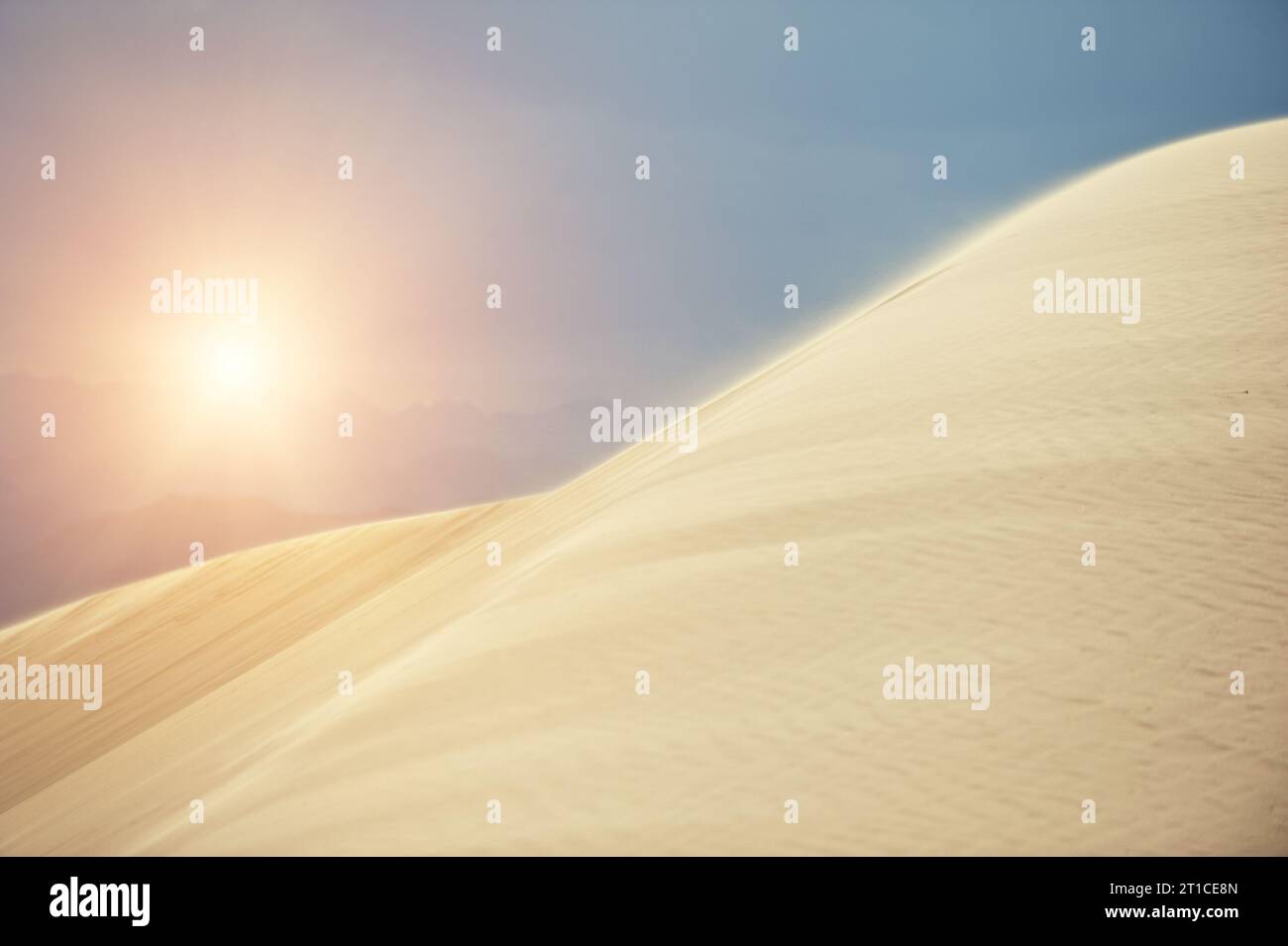 sand dune with sun in the background Stock Photo - Alamy