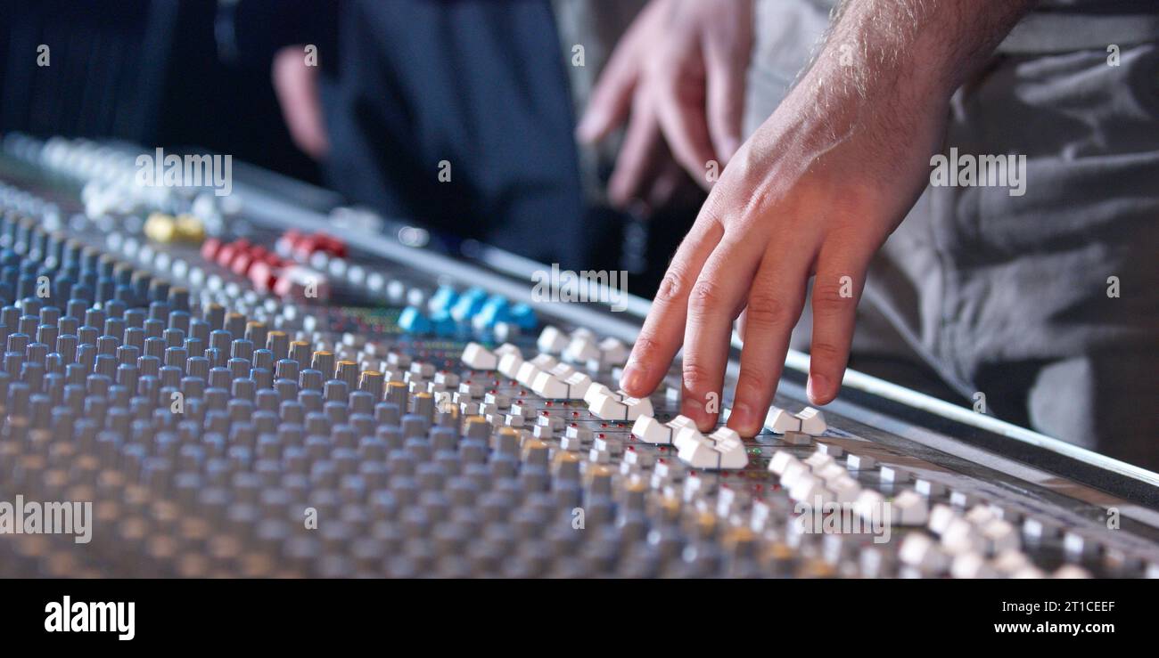 Hand dj on mixer hi-res stock photography and images - Alamy