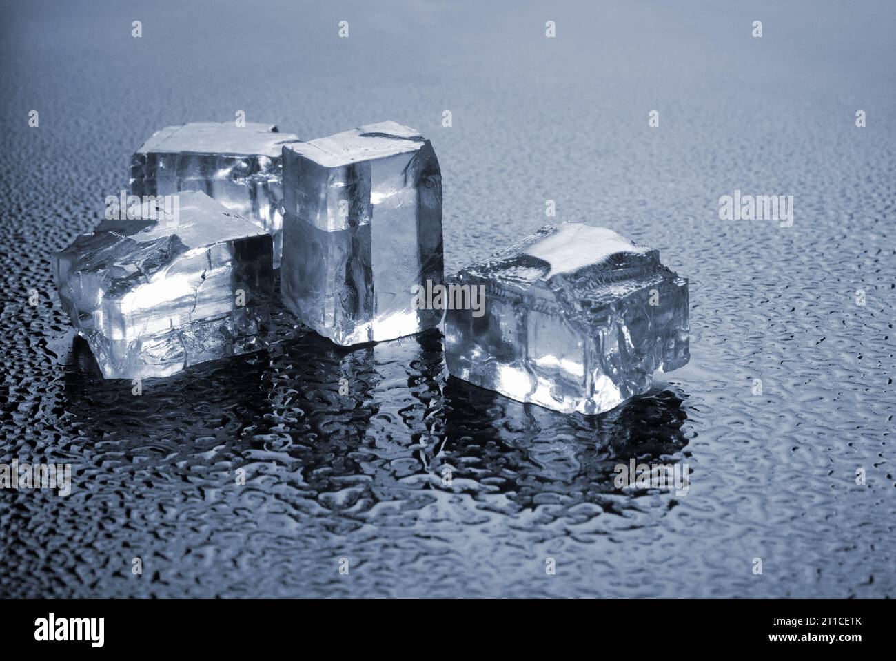 group of melted ice cubes with water drops Stock Photo - Alamy