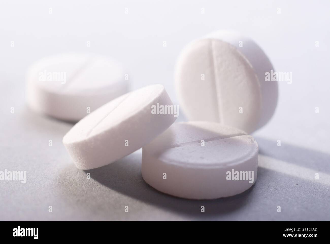 white drugs on white background close up Stock Photo - Alamy