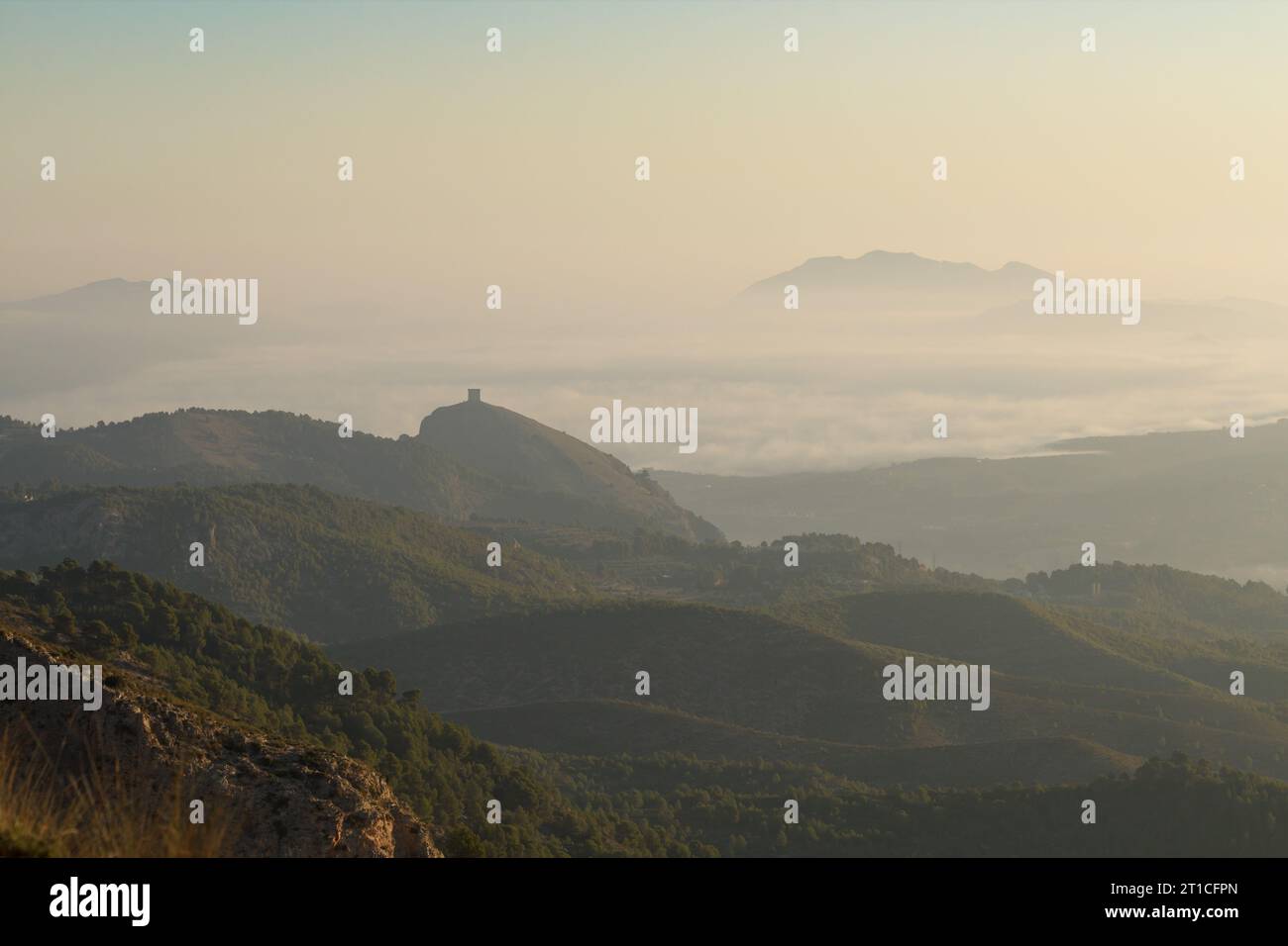 Sunrise landscape with fog and horizon in Cocentaina valley, Spain ...