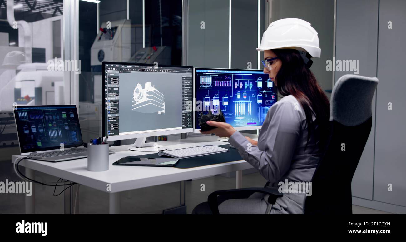 Engineer Doing 3D CAD Model Design On Computer At Factory Stock Photo ...