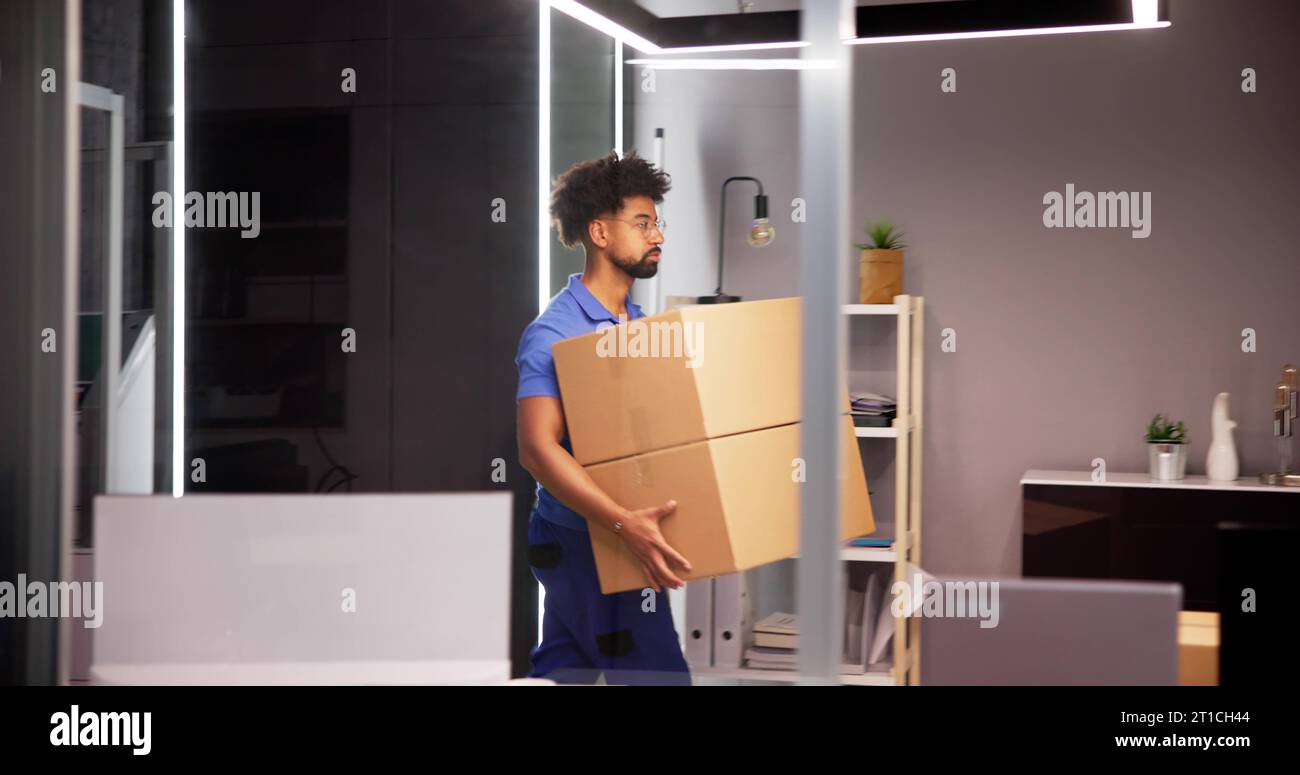 Workers moving carrying boxes hi-res stock photography and images - Alamy