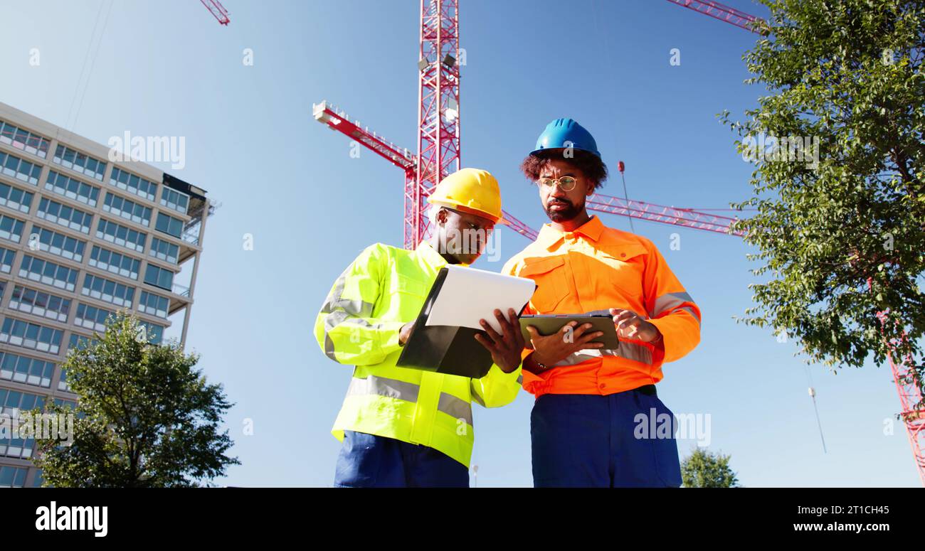 OSHA Inspector At Construction Site. Young Engineer Worker Stock Photo ...