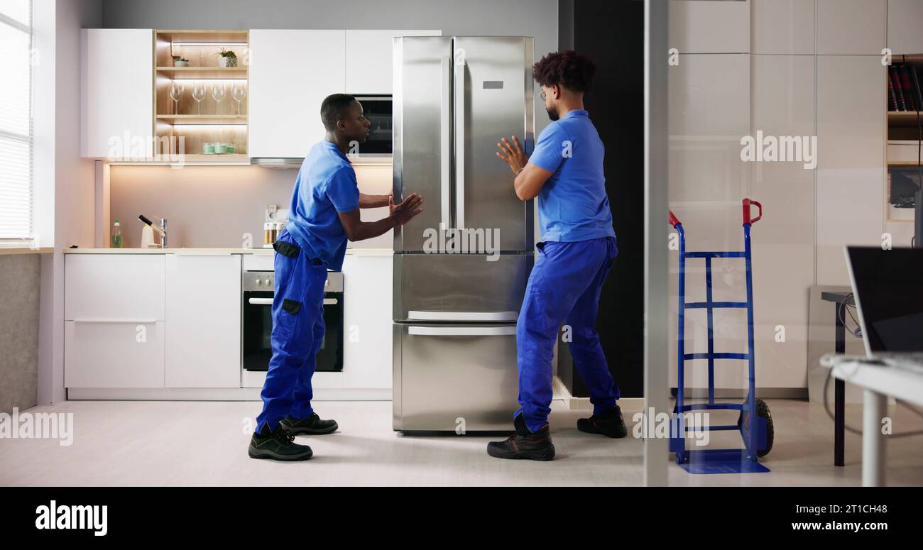 Man move fridge hi-res stock photography and images - Alamy