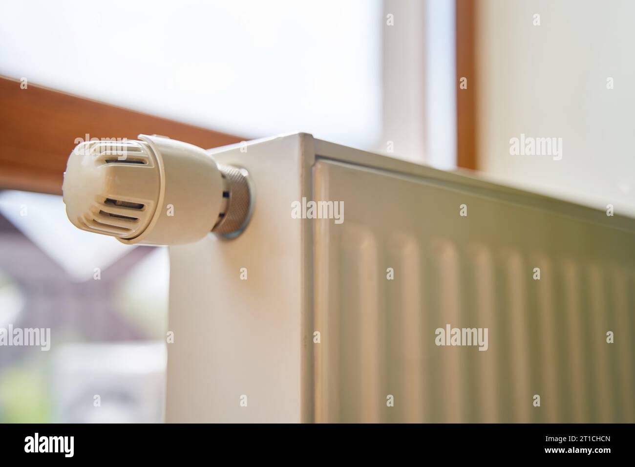 Radiator in the apartment. White heated battery Stock Photo - Alamy