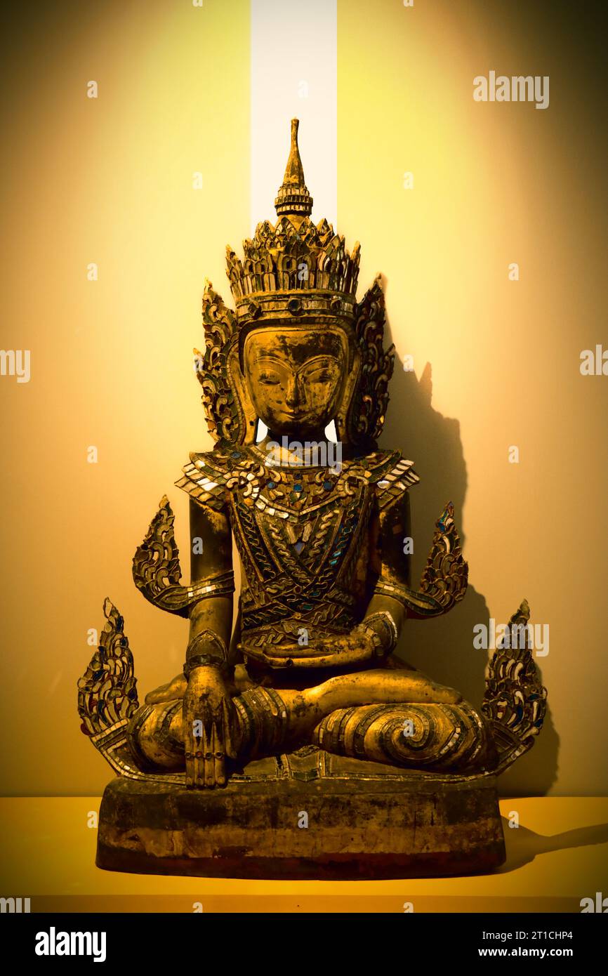 an antique wood statue of Crowned Buddha of subduing Mara from 17th ...