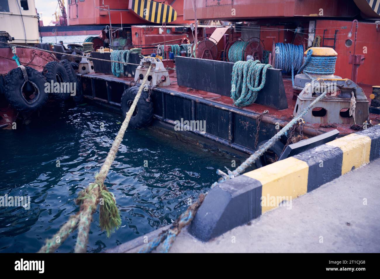 Mooring ropes, The vessel is moored alongside a pier Stock Photo - Alamy