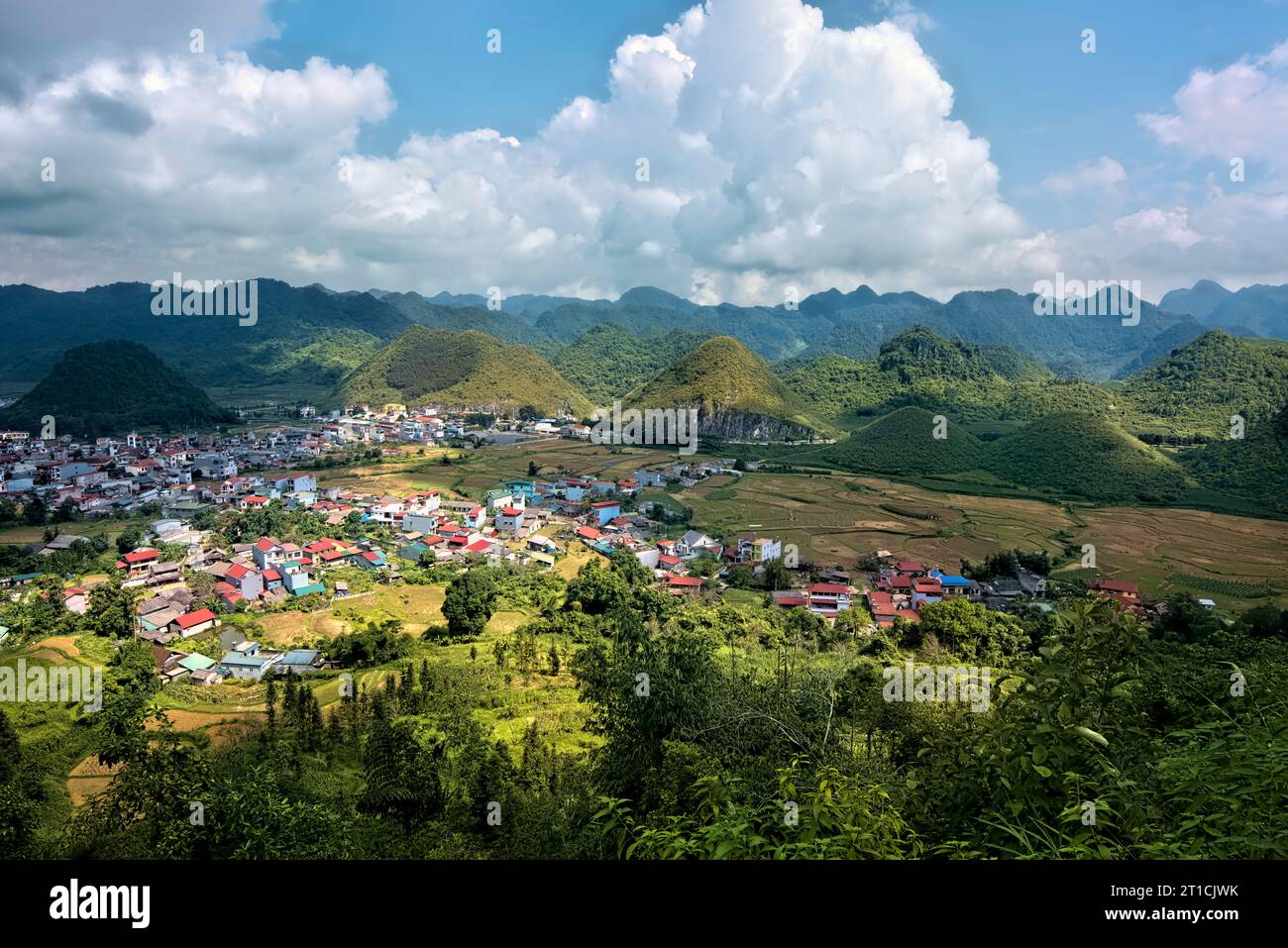 View of the Twin Mountains and limestone karst plateau from Quan Ba ...