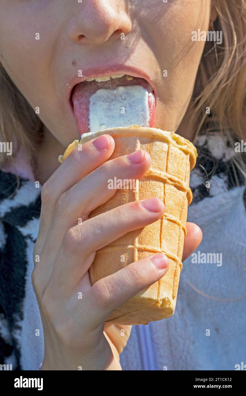 Licking a ice cream hi-res stock photography and images - Alamy