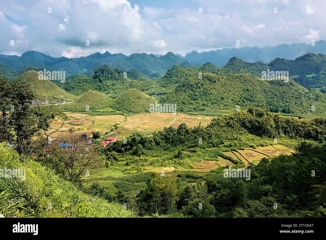 View of the Twin Mountains and limestone karst plateau from Quan Ba ...