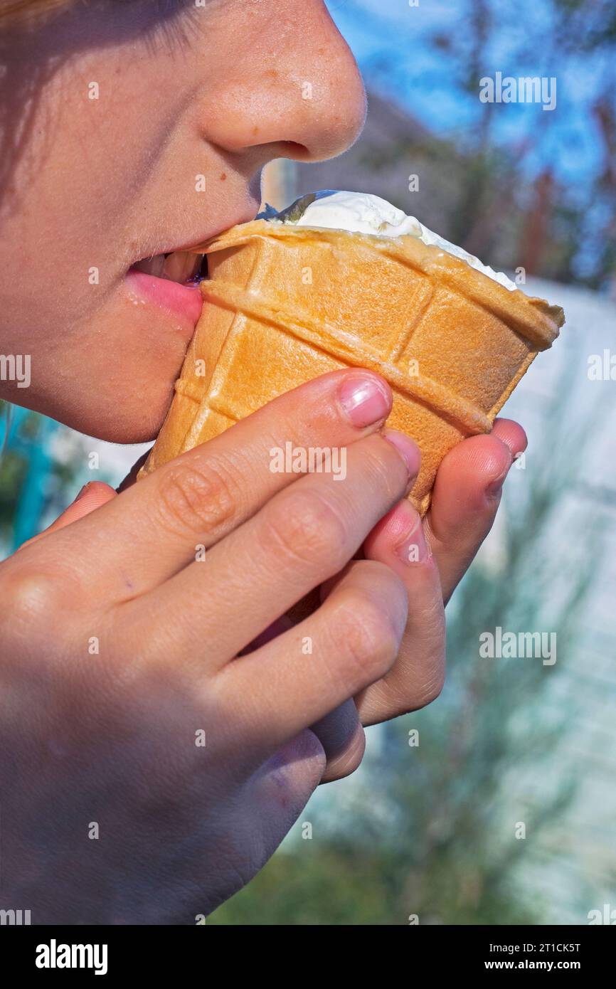 Biting into waffle hi-res stock photography and images - Alamy