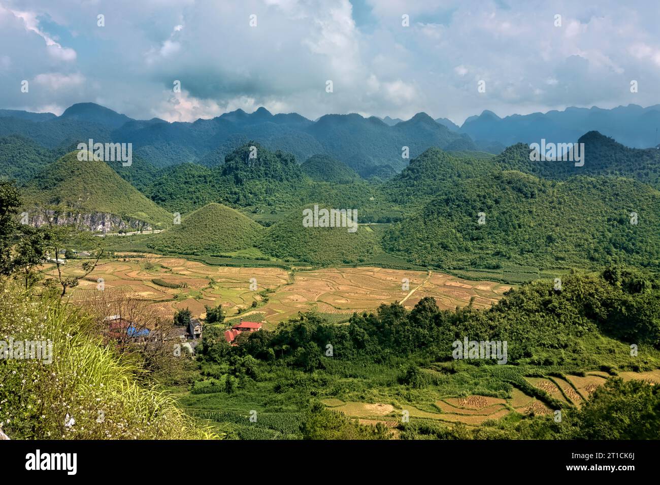 View of the Twin Mountains and limestone karst plateau from Quan Ba ...