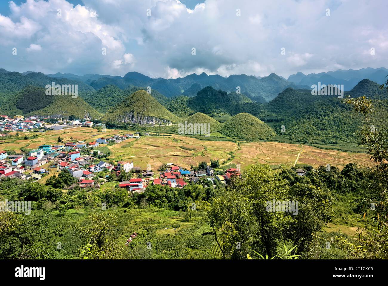 View of the Twin Mountains and limestone karst plateau from Quan Ba ...