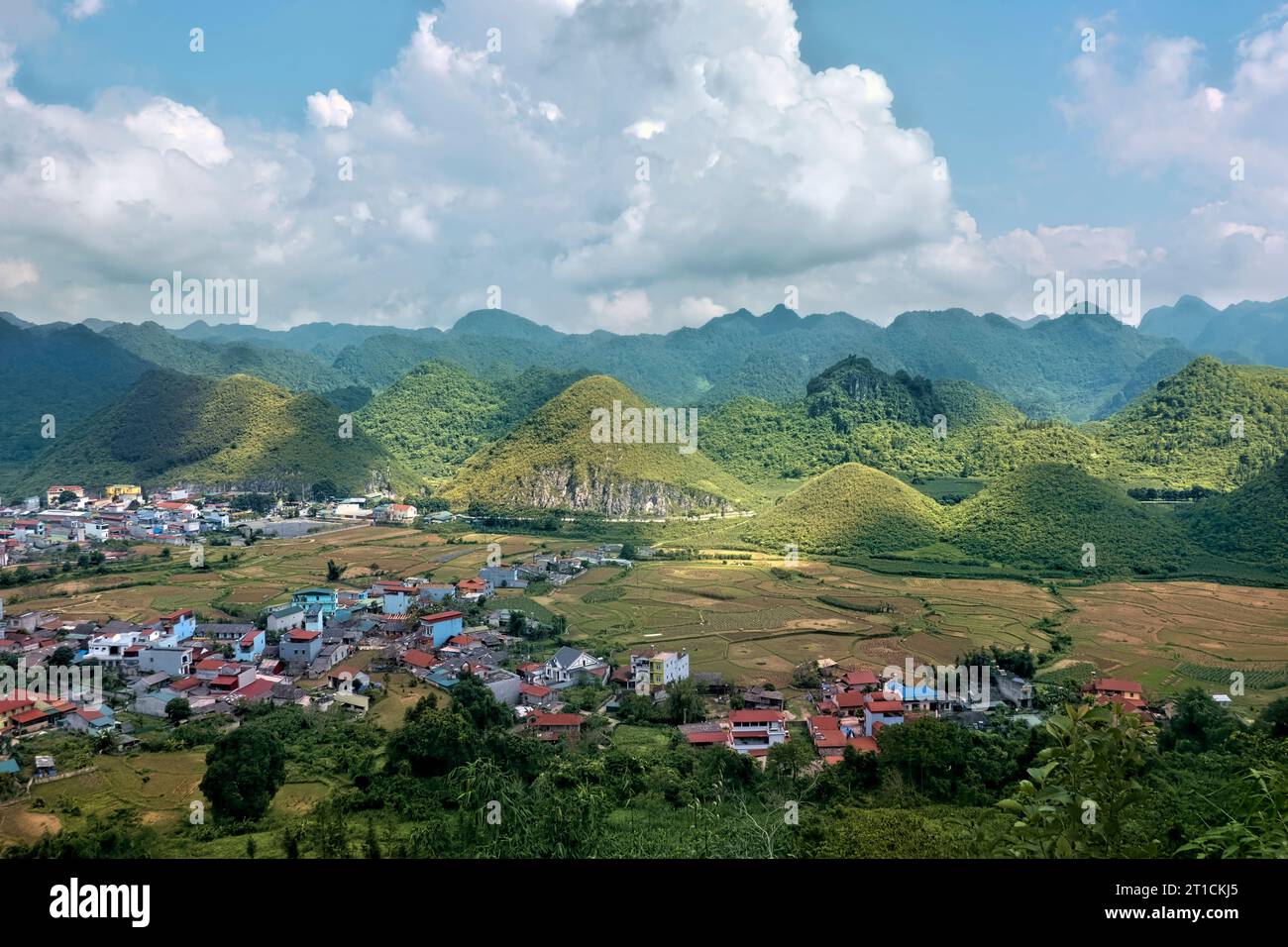 View of the Twin Mountains and limestone karst plateau from Quan Ba ...