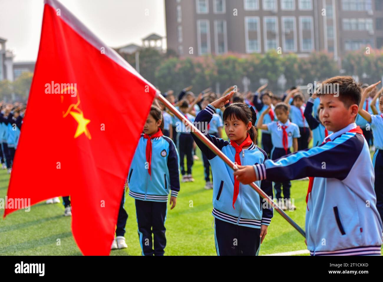 QINGZHOU, CHINA - OCTOBER 13, 2023 - Primary school students salute at ...