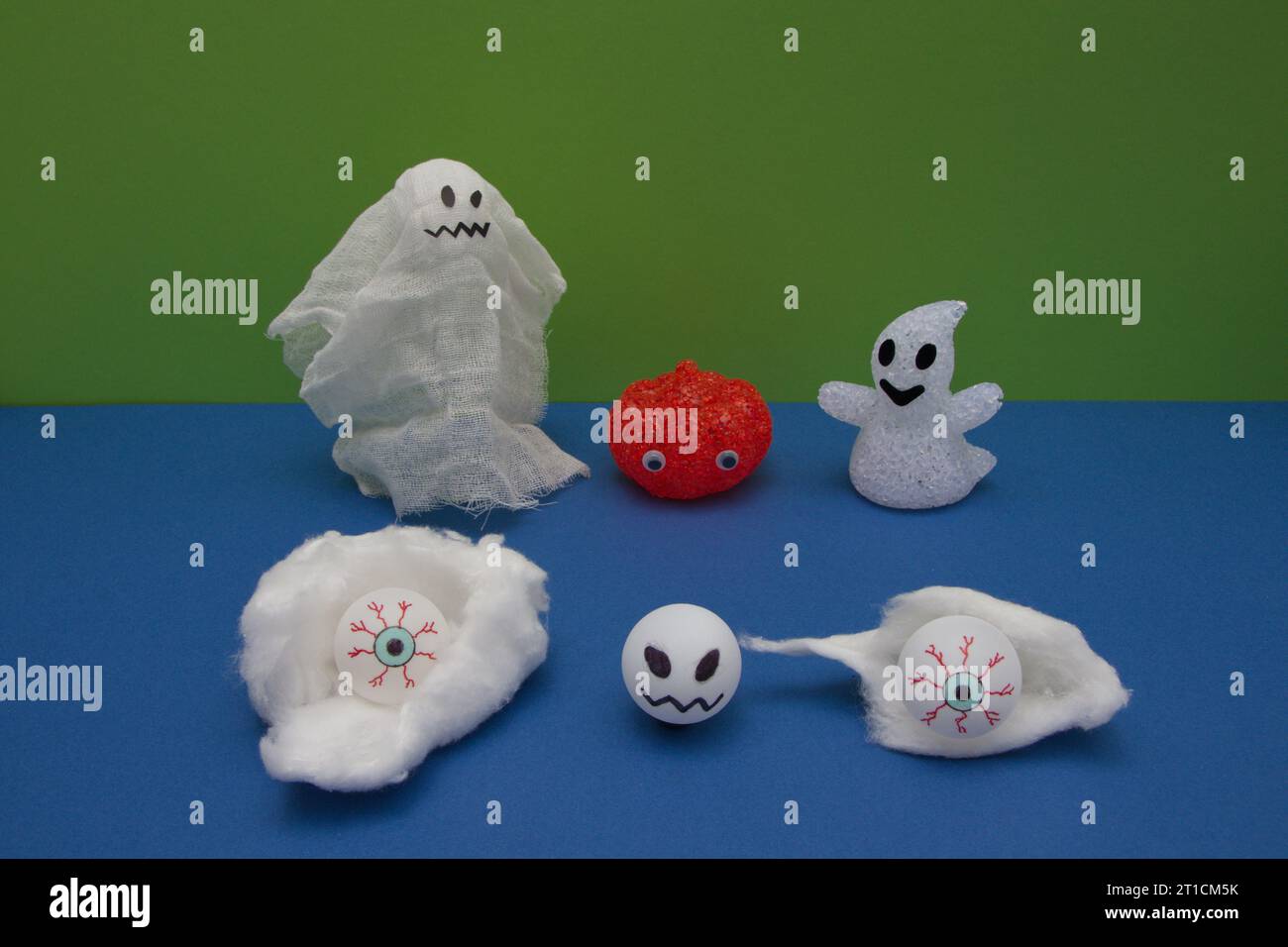 Creepy ghosts rejoice with pumpkin while in front of them are dominant ...