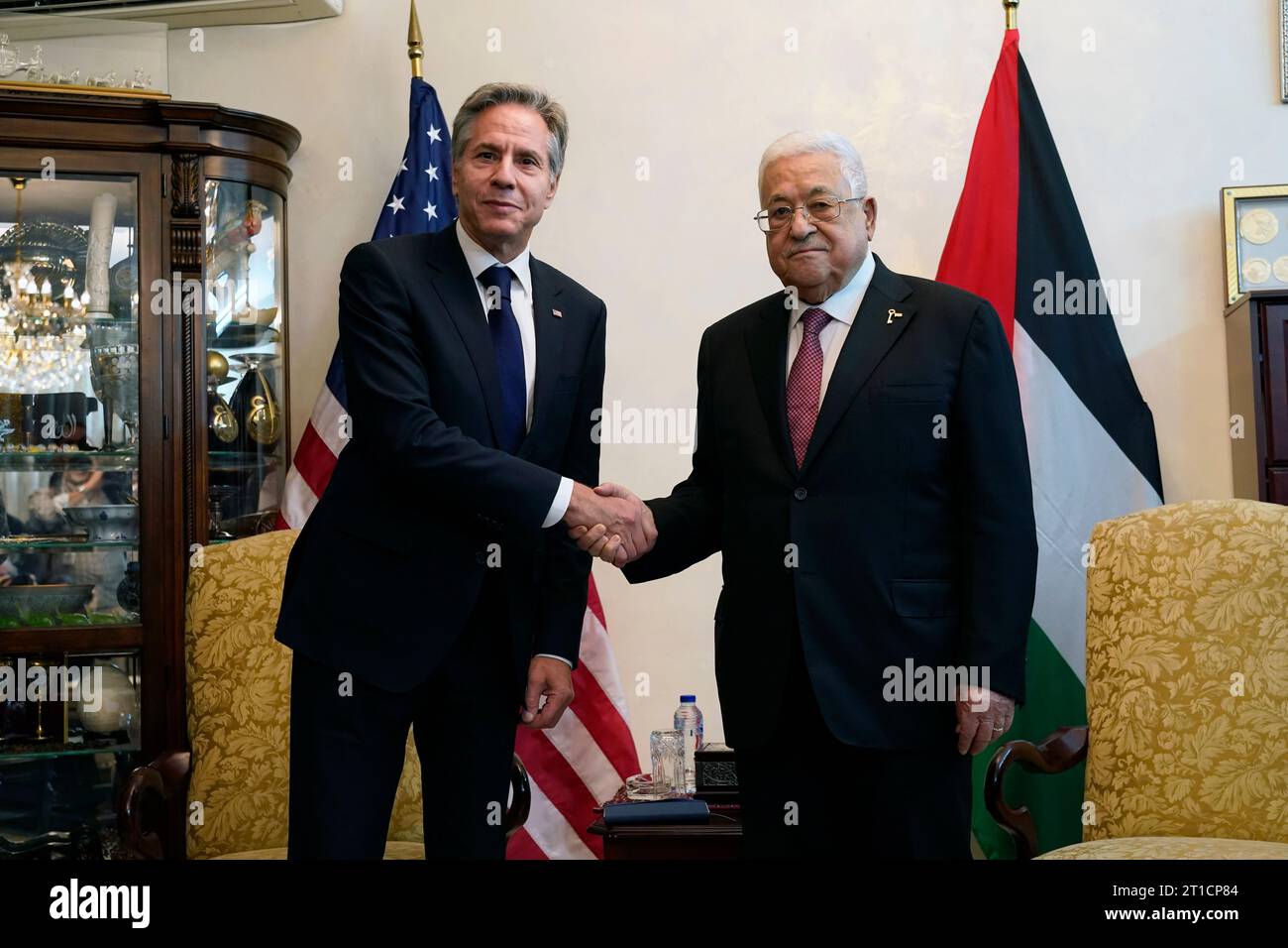 U.S. Secretary of State Antony Blinken, left, shake hands with ...