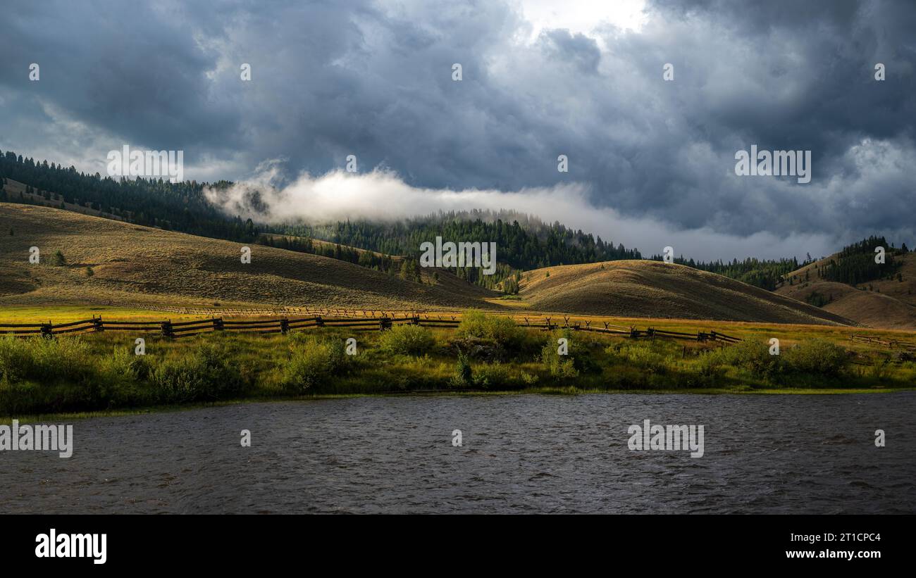 A scenic landscape with a tranquil pastoral setting featuring an ...