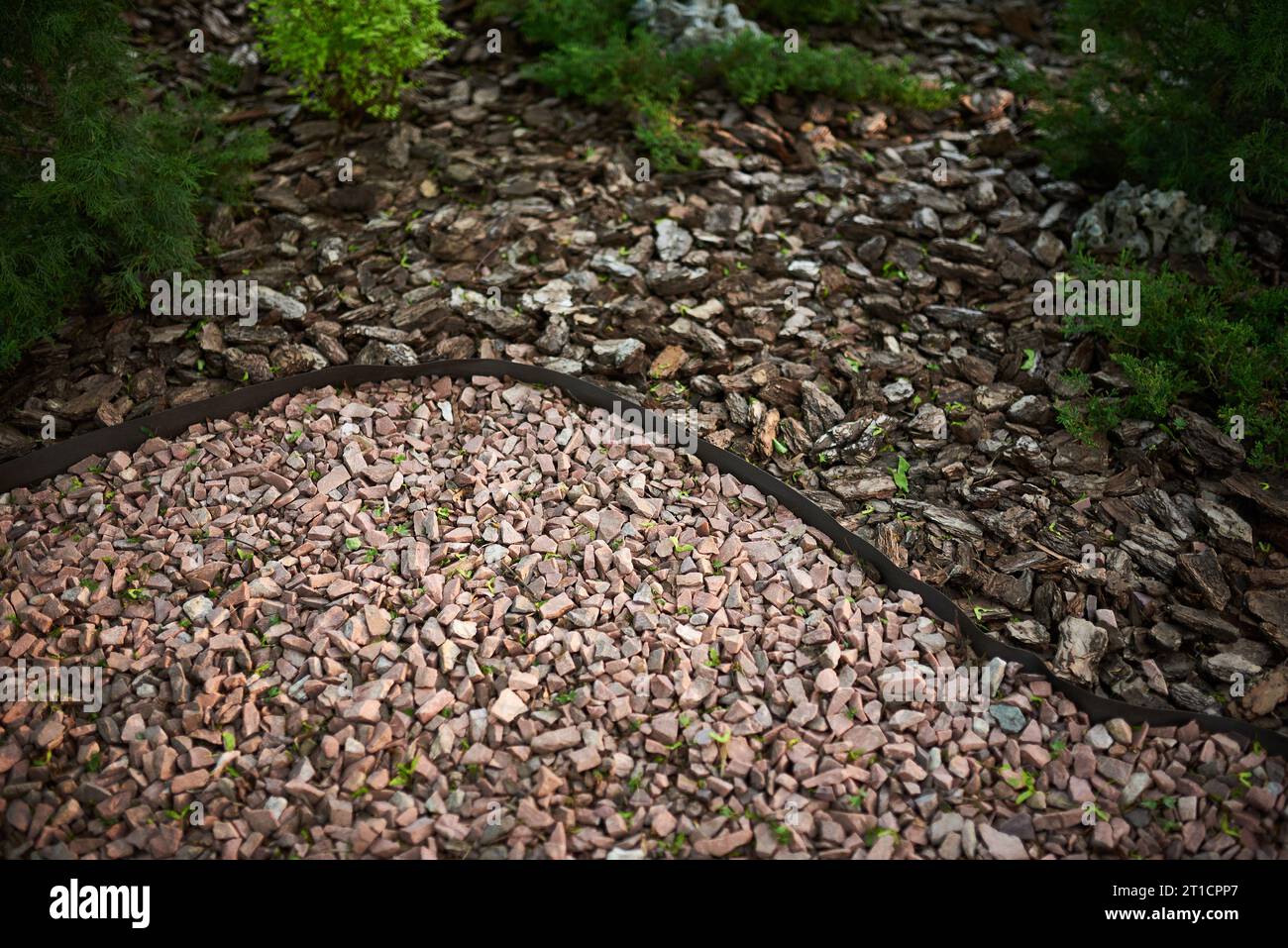 gray gravel walk path with lawn at park Stock Photo - Alamy