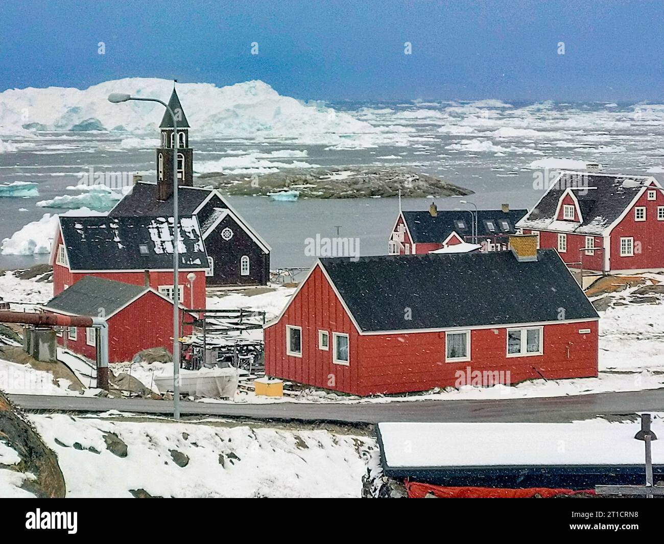 Ilulissat – the village with famous Eisfjord in snow, Greenland Stock ...