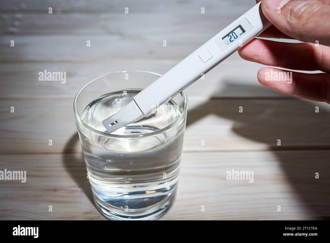 A researcher uses a electric water tester to test the electrical ...