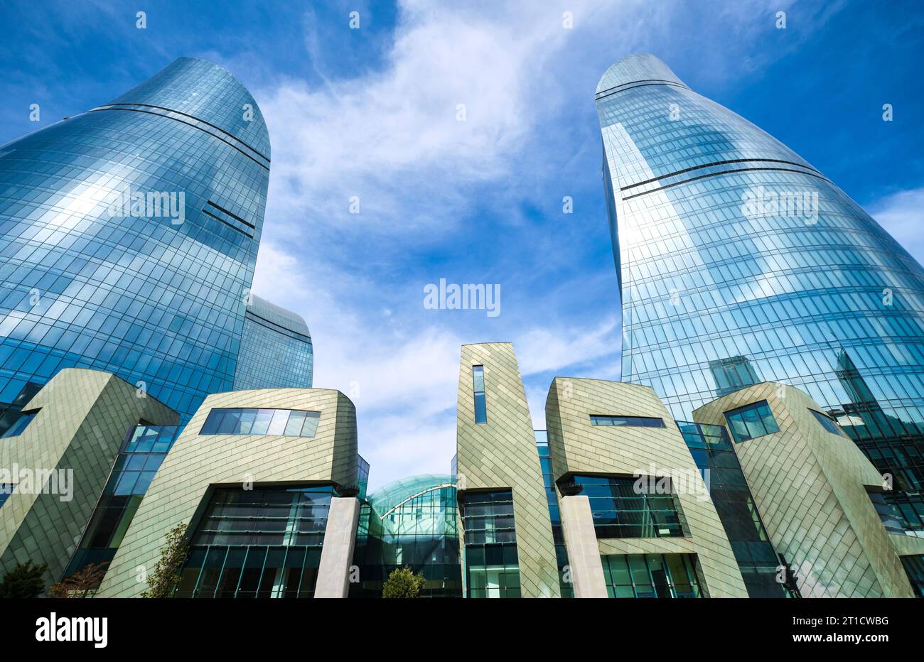 At the iconic, modern, blue glass Flame Towers, designed by HOK. In ...