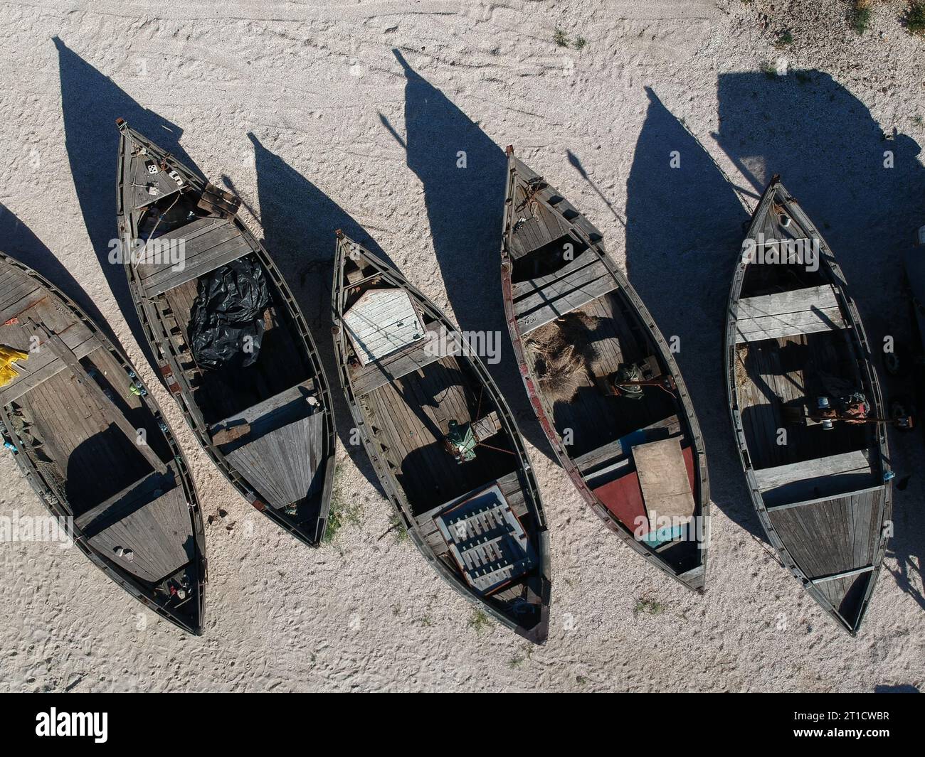 Aerial of a traditional fisher boats on a sand beach. Ukraine, Azov sea ...