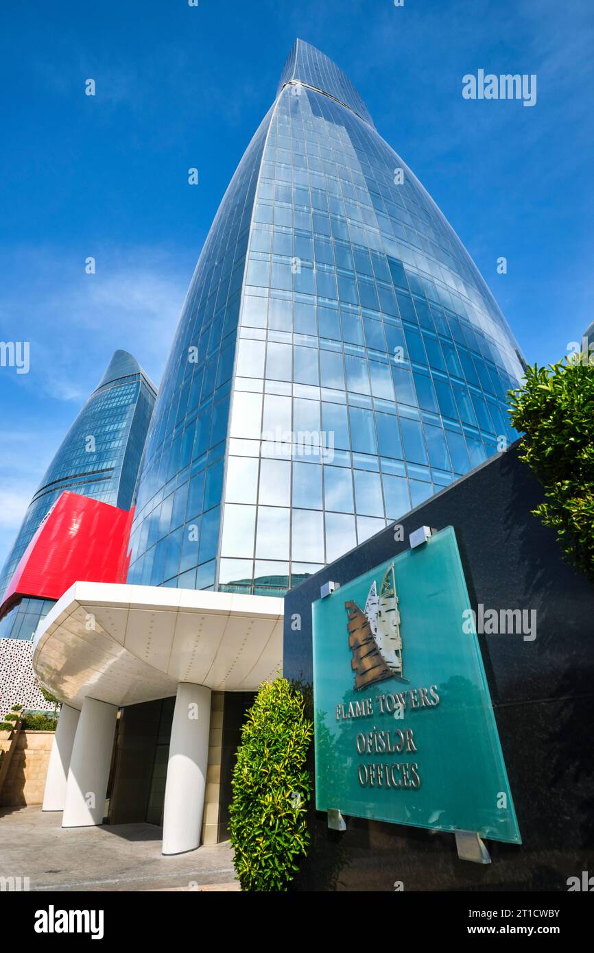 At the iconic, modern, blue glass Flame Towers, designed by HOK. Sign ...