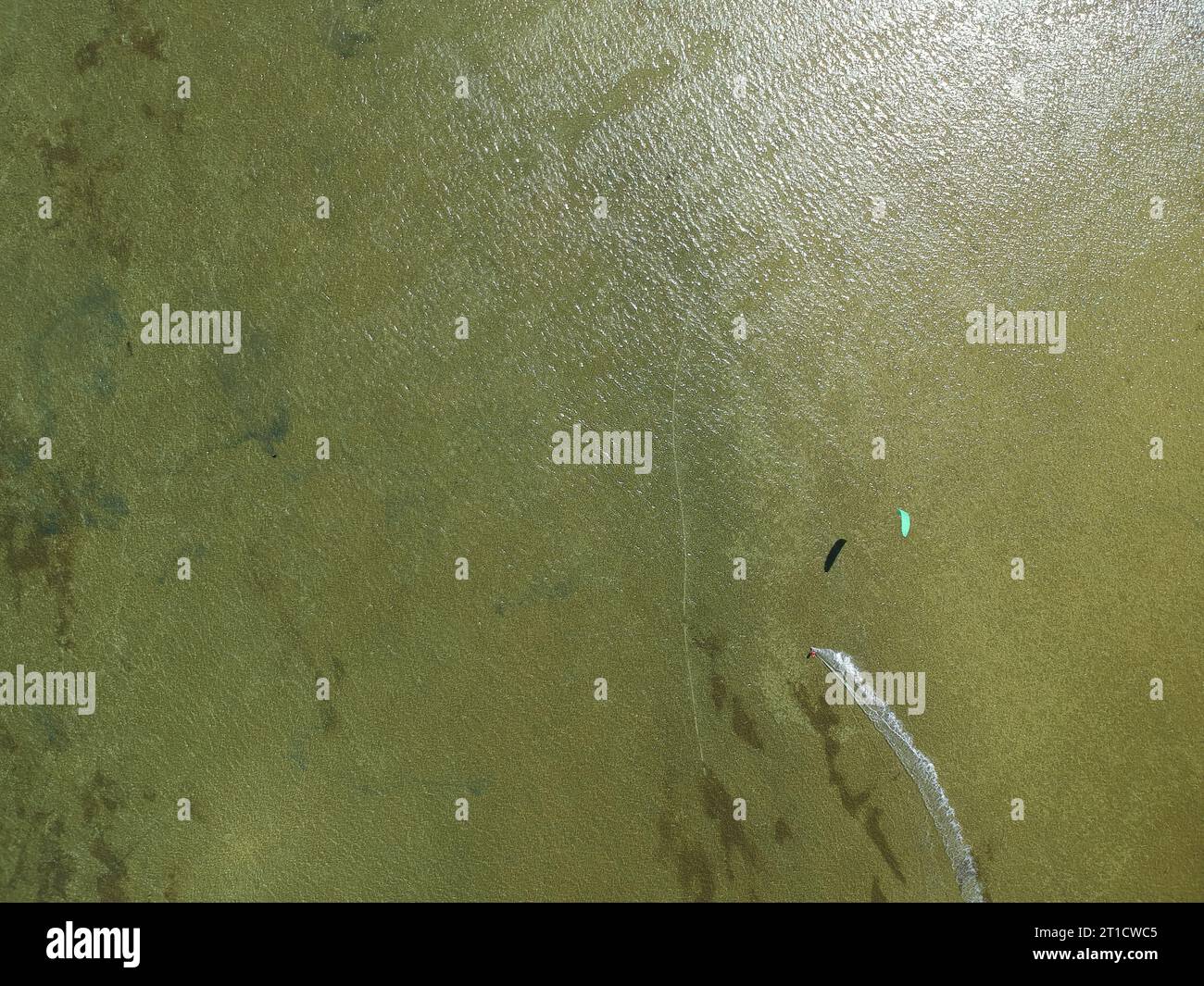 kitesurfer in action aerial view from drone at sunny day Stock Photo ...