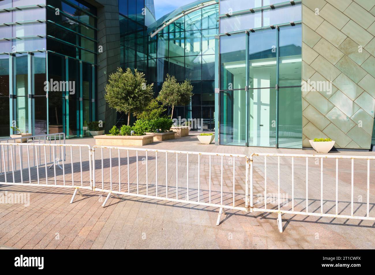 At the iconic, modern, blue glass Flame Towers, designed by HOK. View ...