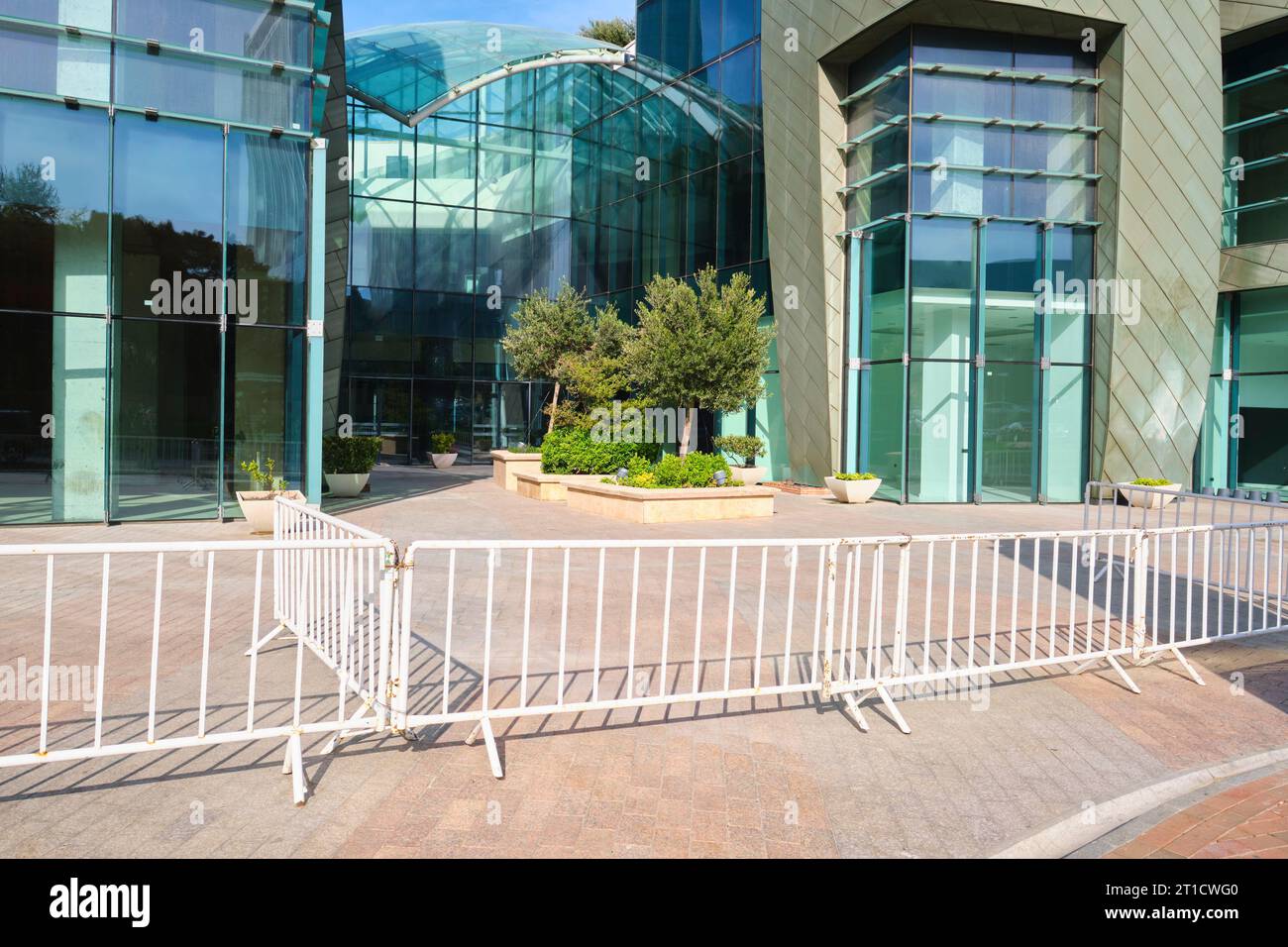 At the iconic, modern, blue glass Flame Towers, designed by HOK. View ...