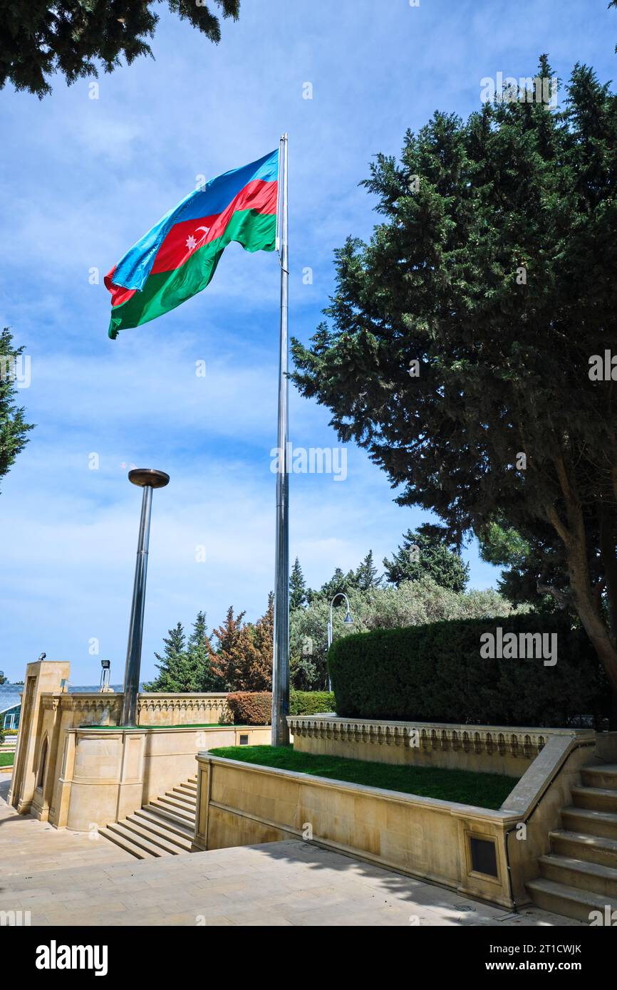 A huge Azerbaijani flag flies on a tall pole at the entrance to the ...