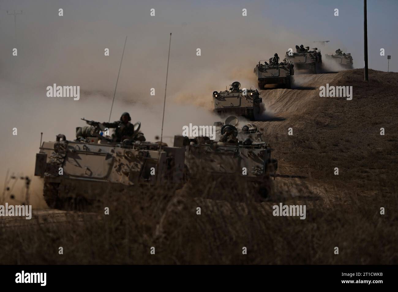 Israeli tanks and APC head towards the Gaza Strip border in southern ...