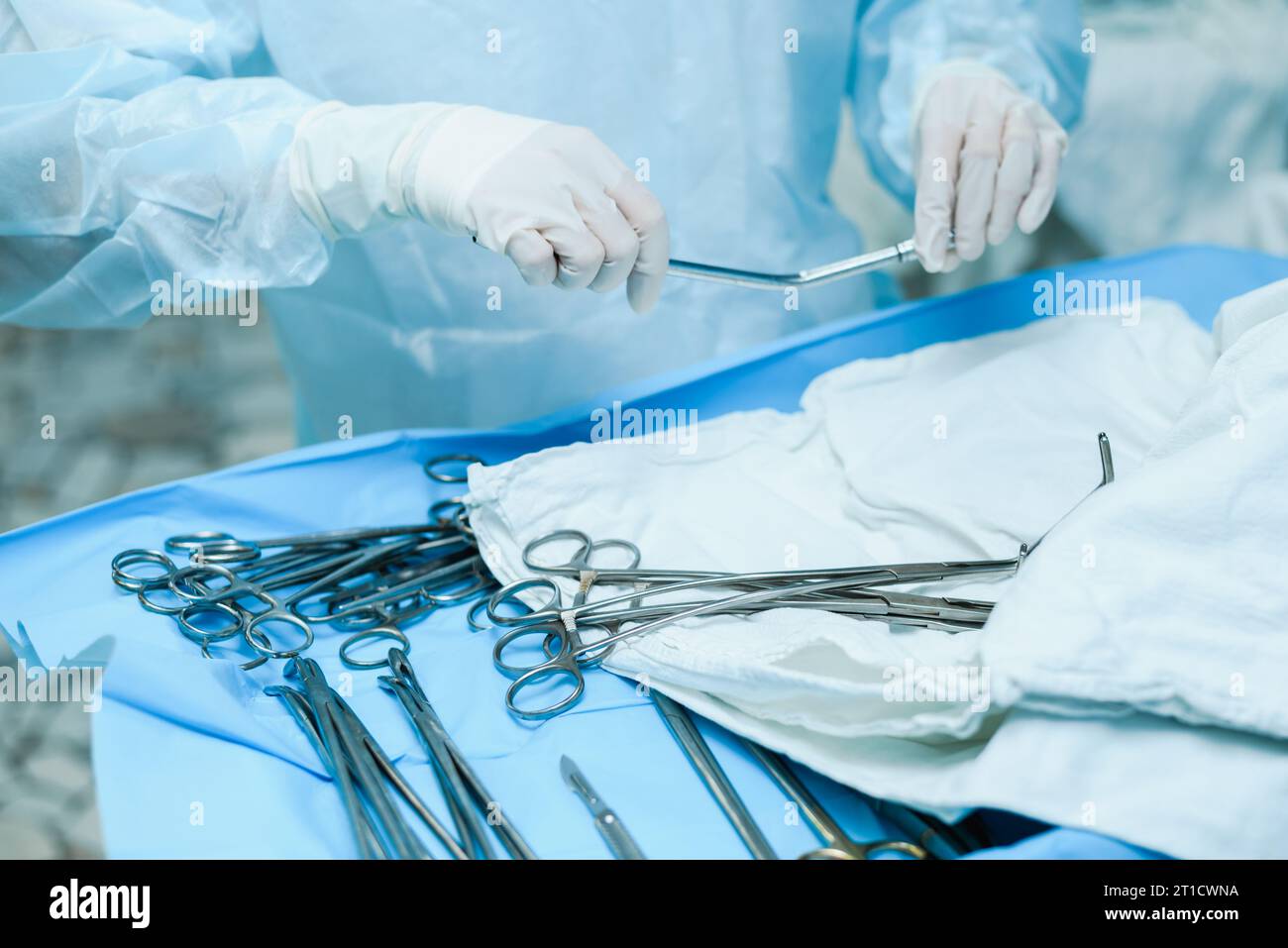Female surgeon preparing instruments hi-res stock photography and ...
