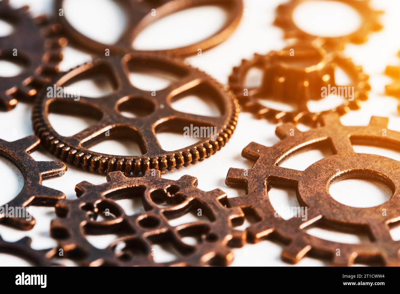 Steampunk made gears on white background Stock Photo - Alamy