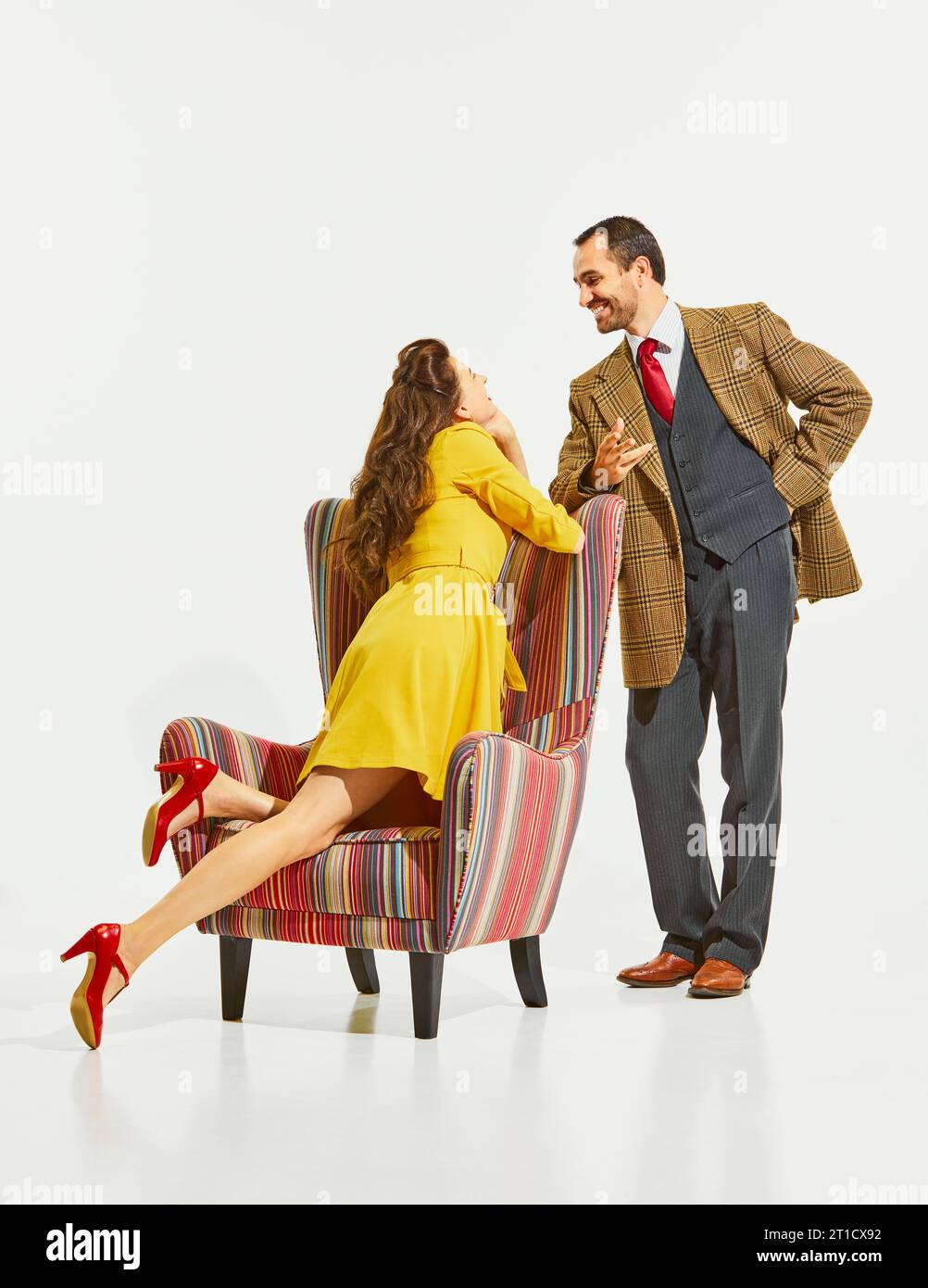 Happy, smiling young people, man and woman cheerfully talking with ...