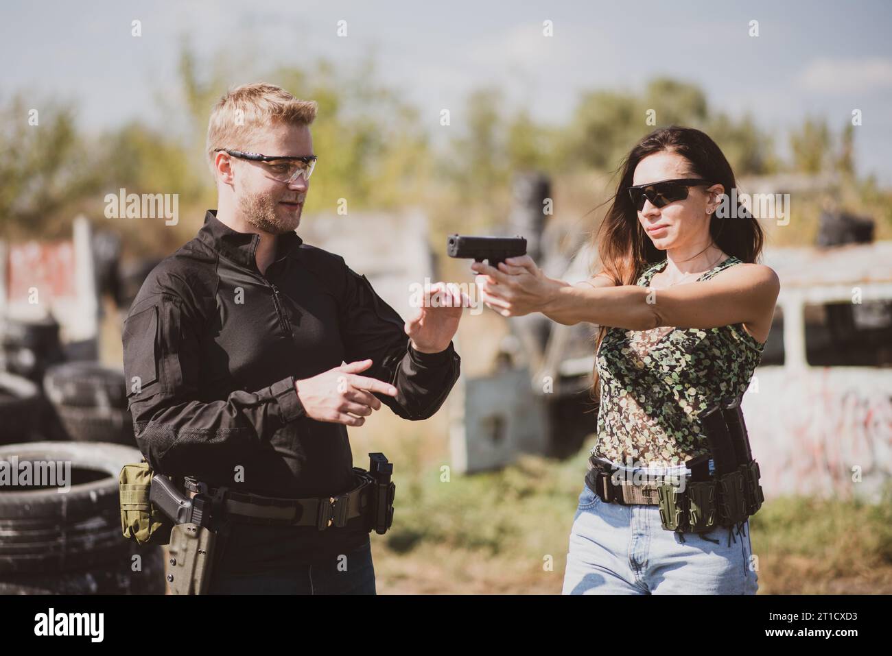 Outdoor shooting range man and woman hi-res stock photography and ...