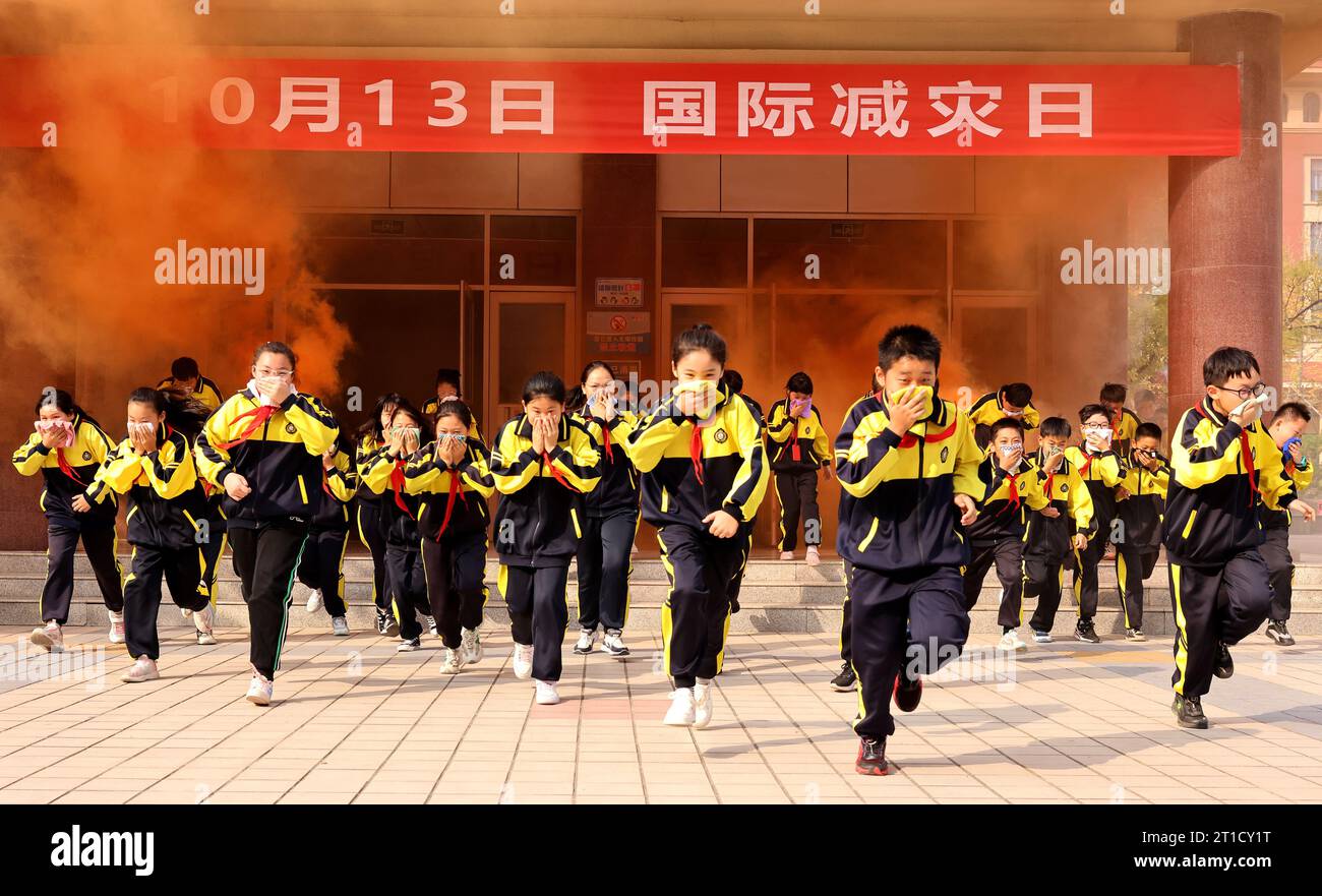 ZAOZHUANG, CHINA - OCTOBER 13, 2023 - Primary school students perform a ...