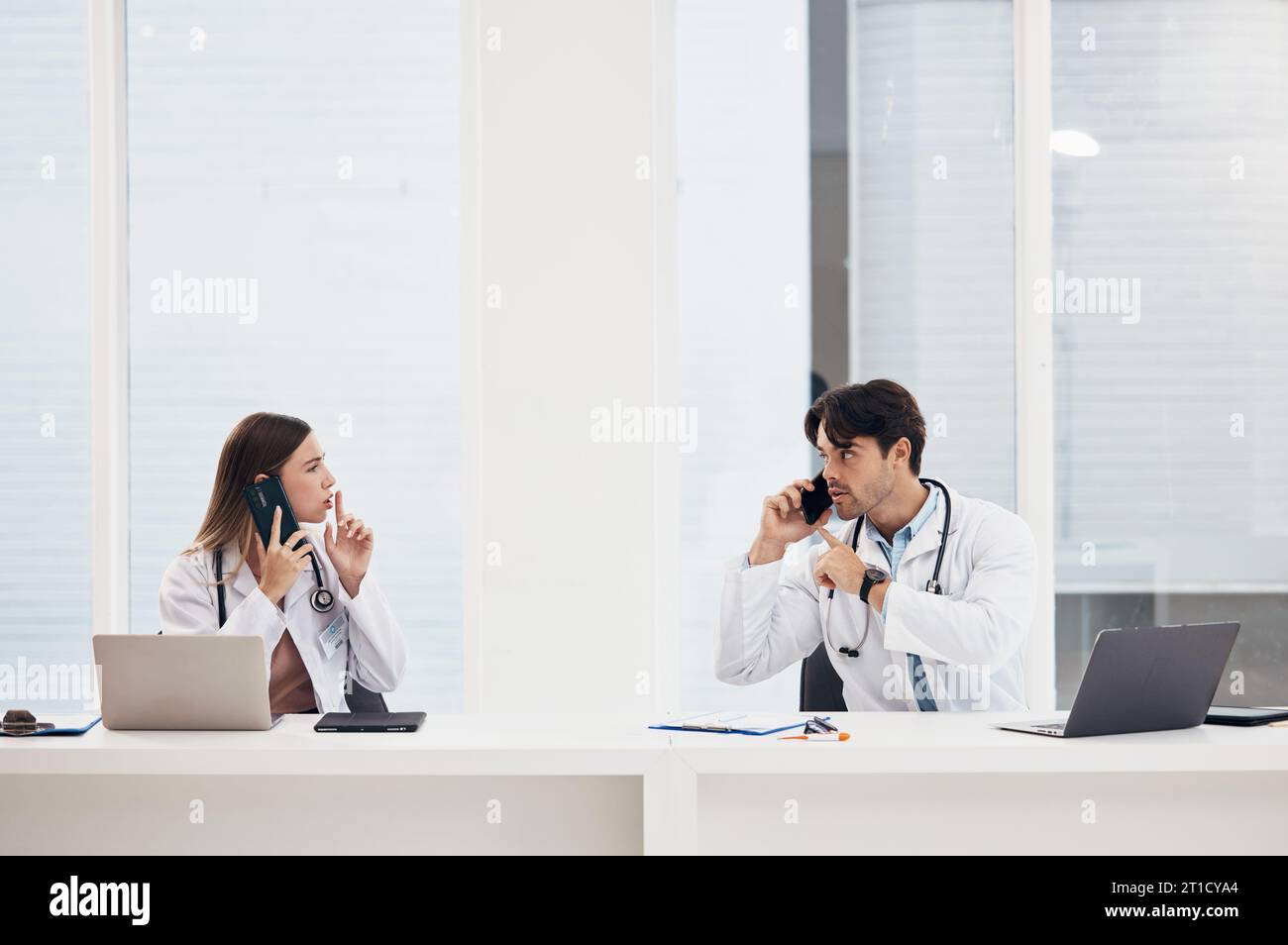 Frustrated doctor phone hi-res stock photography and images - Alamy