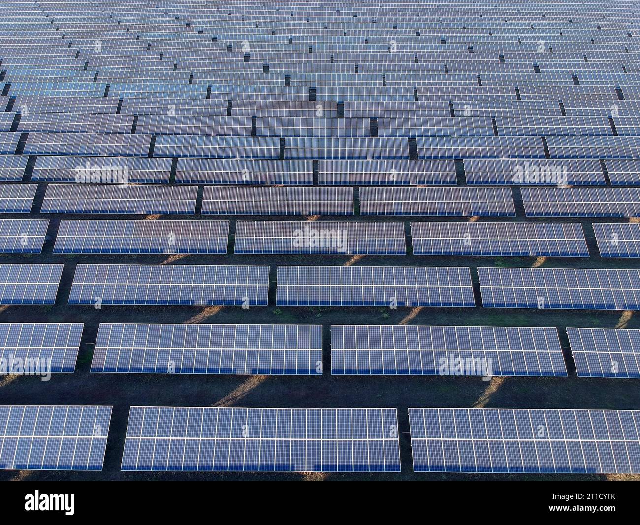 Aerial photo of solar power plant. Many solar energy panels in ...