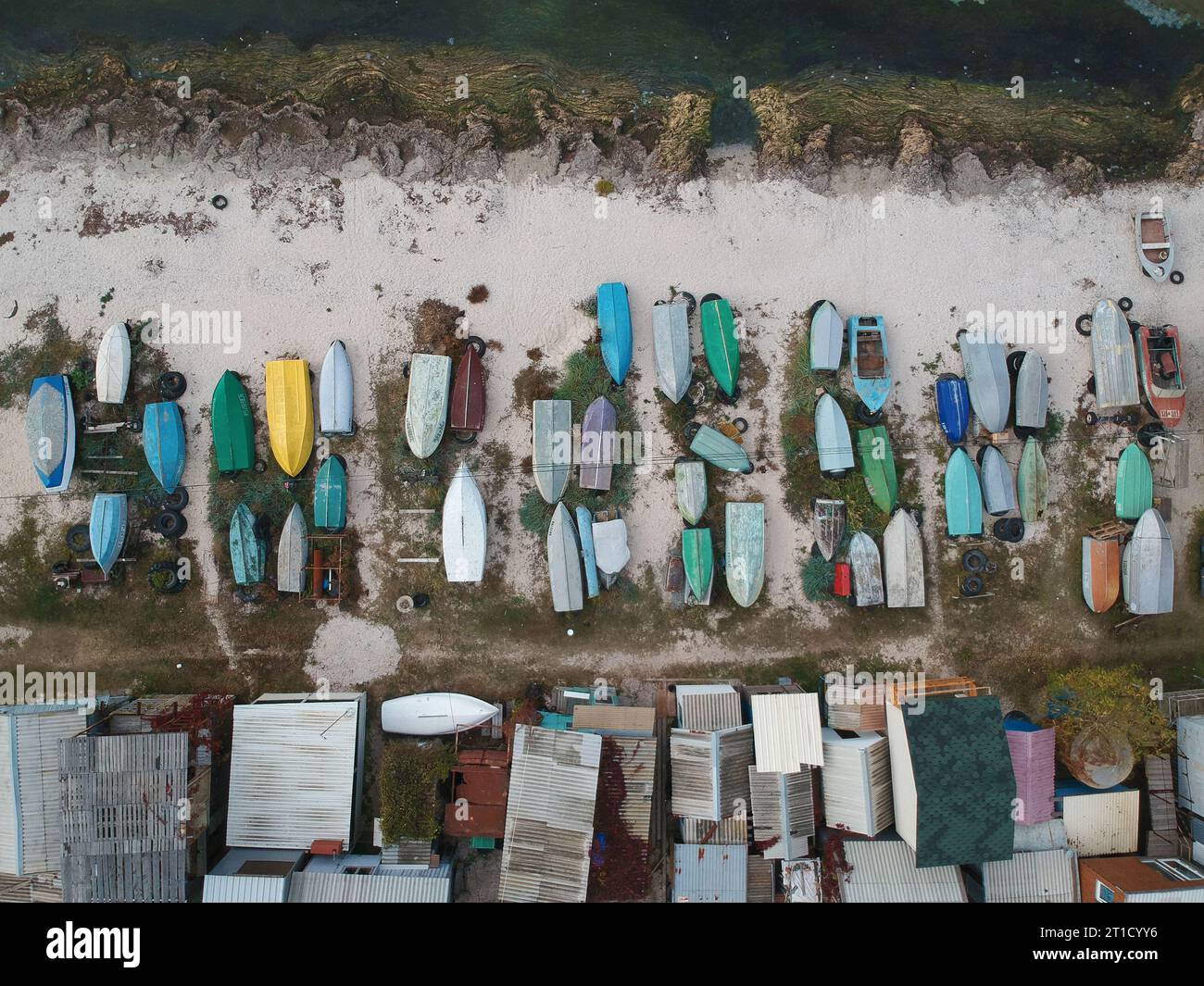 Aerial of a traditional fisher boats on a sand beach. Ukraine, Azov sea ...