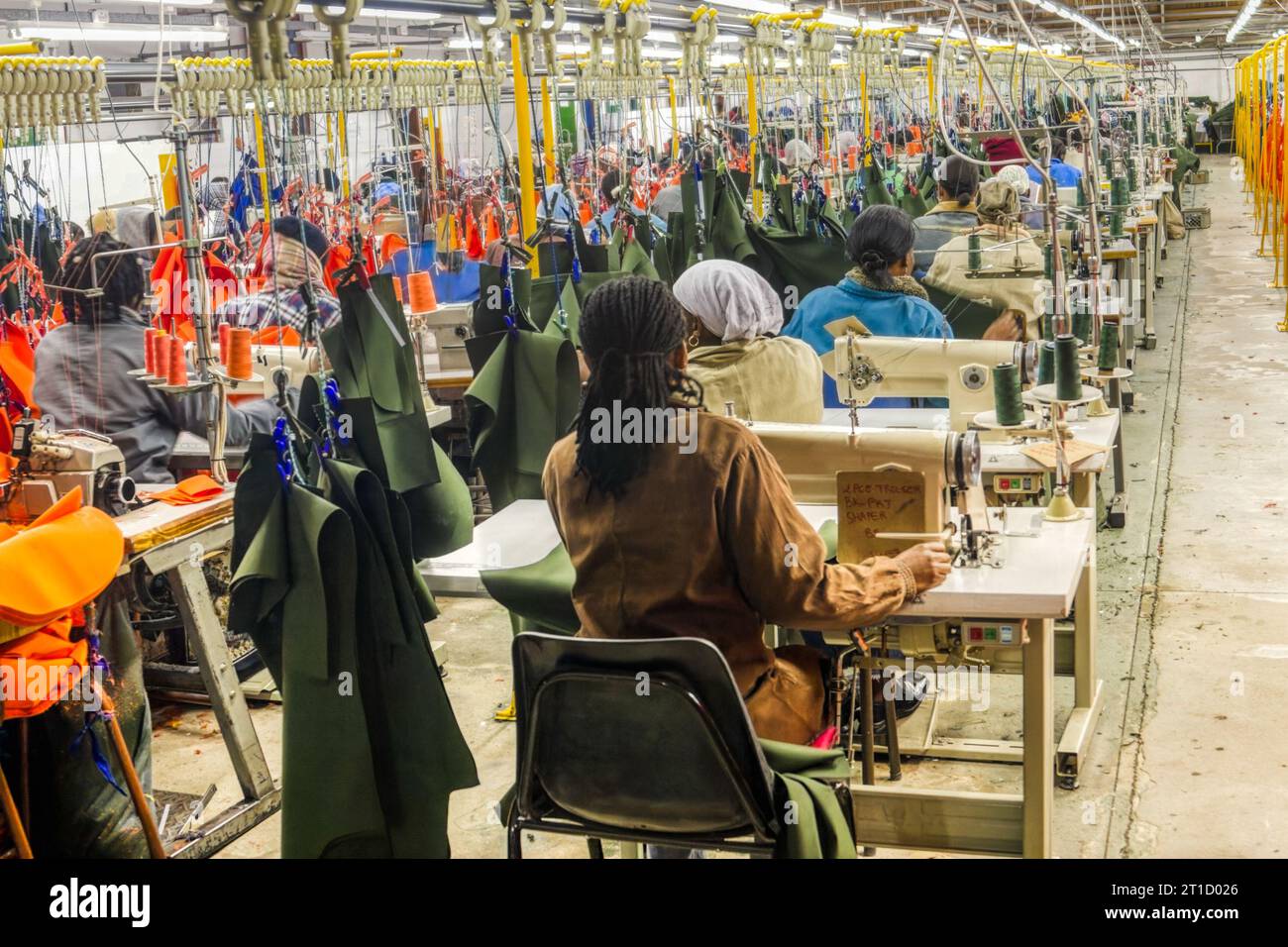 african woman factory workers in the textile industry working on ...