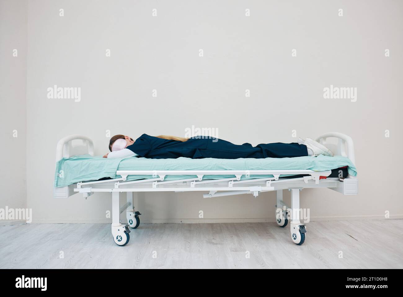 Doctor, sleeping and break on hospital bed, tired and burnout from ...