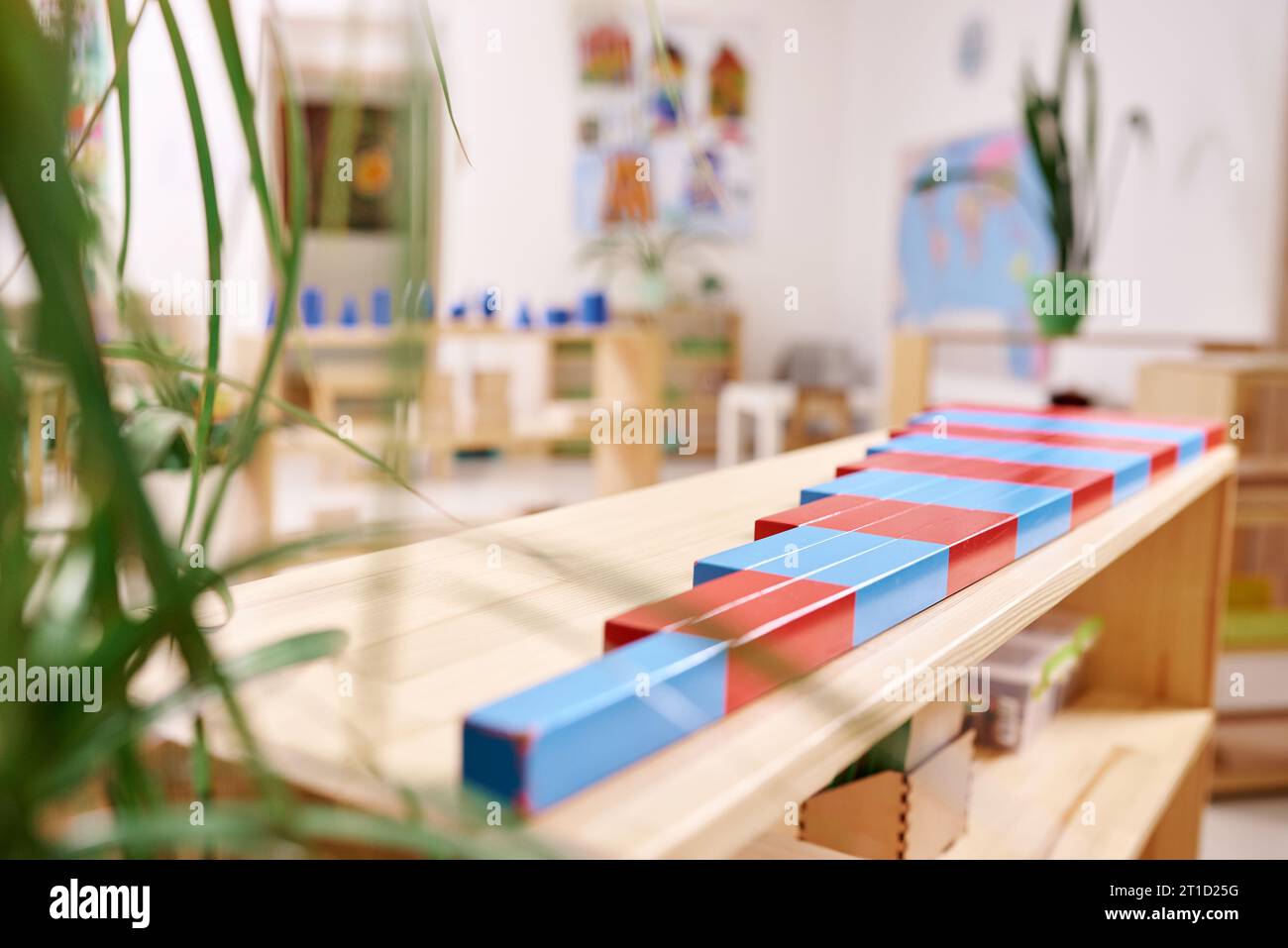 Light class in Montessori kindergarten. The colorful numeric rods in ...