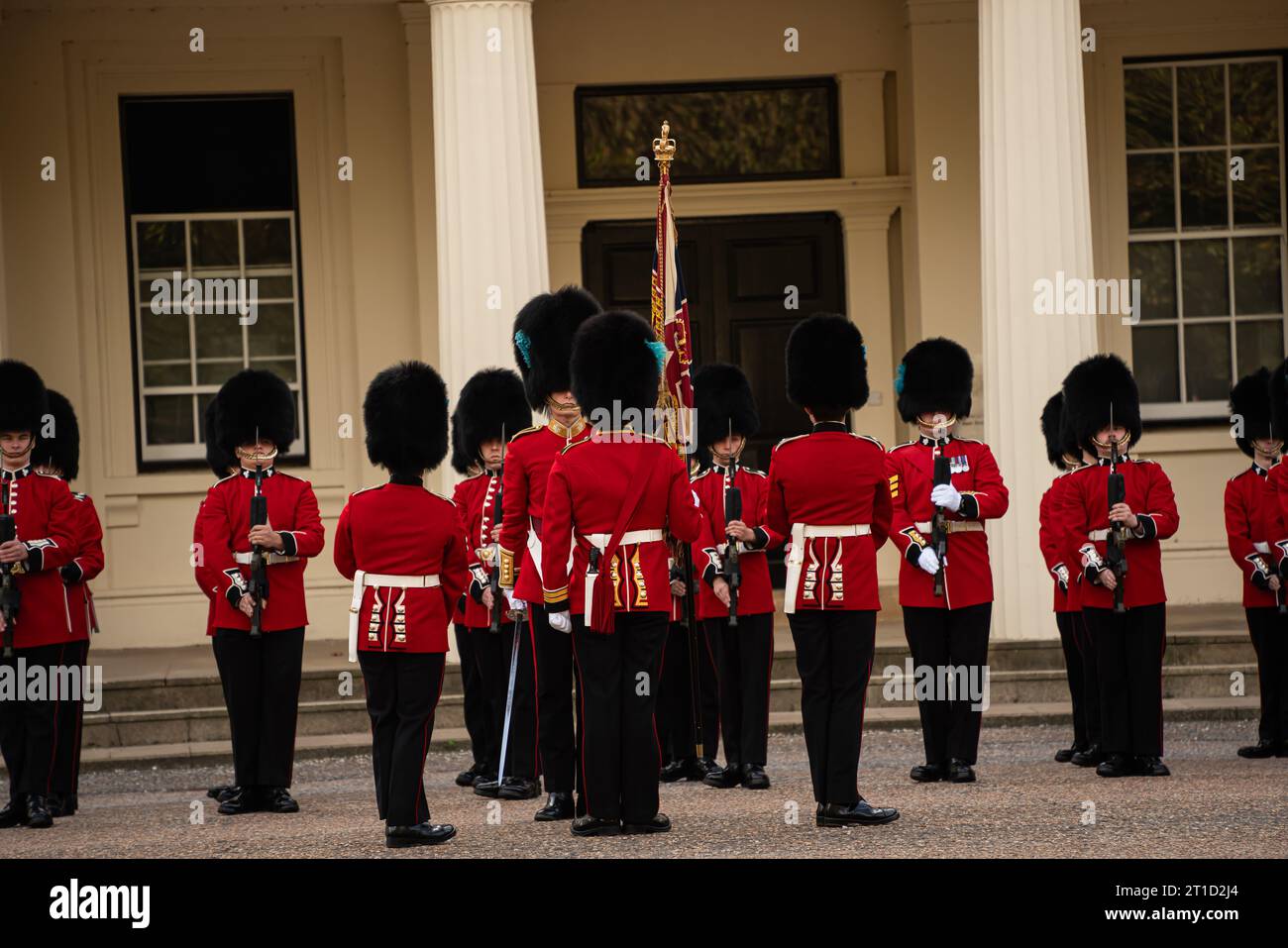 Changing the Guards at Buckingham Palace takes place in front of ...