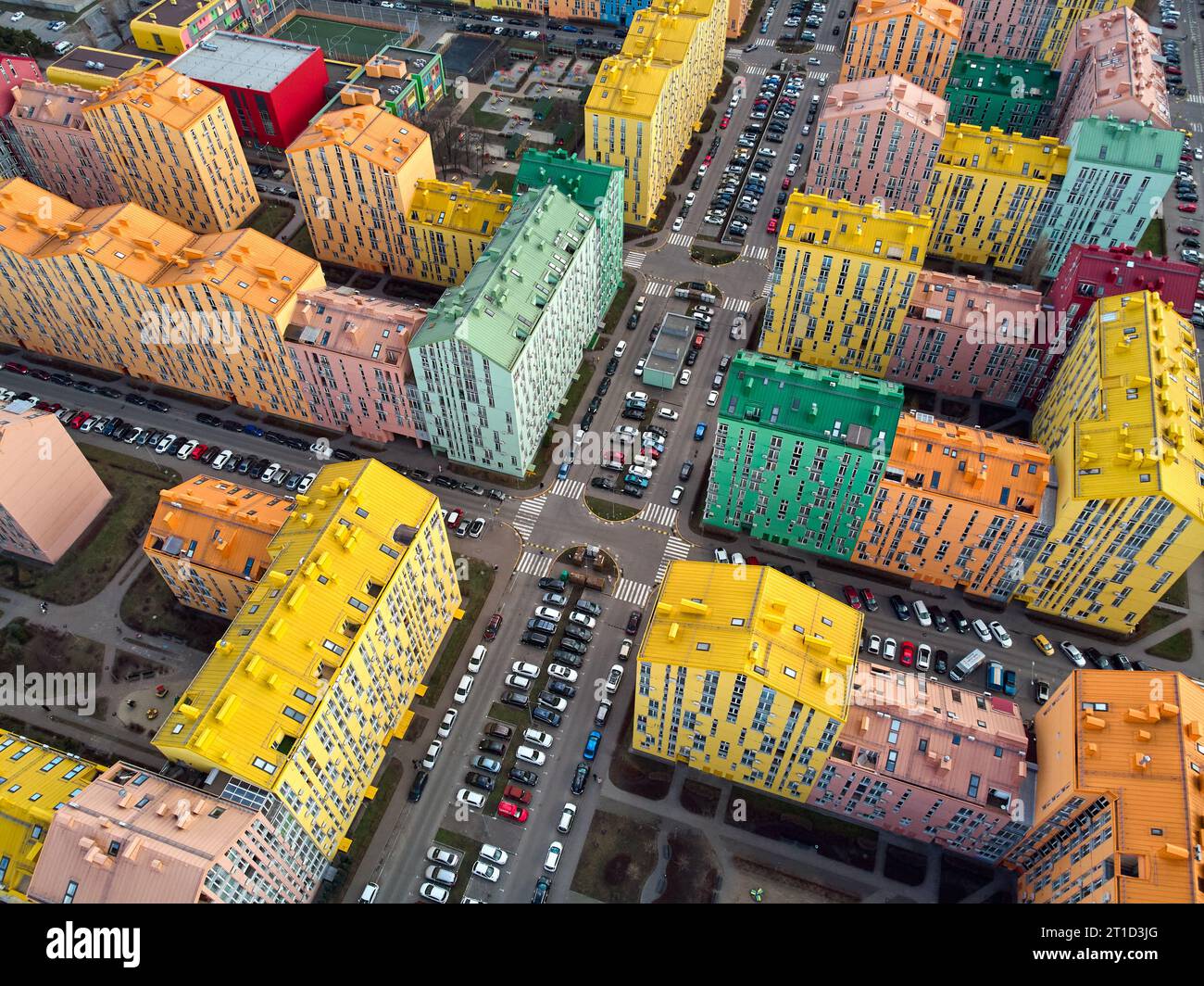Aerial top view of a drone in the colorful modern city. Comfort town ...